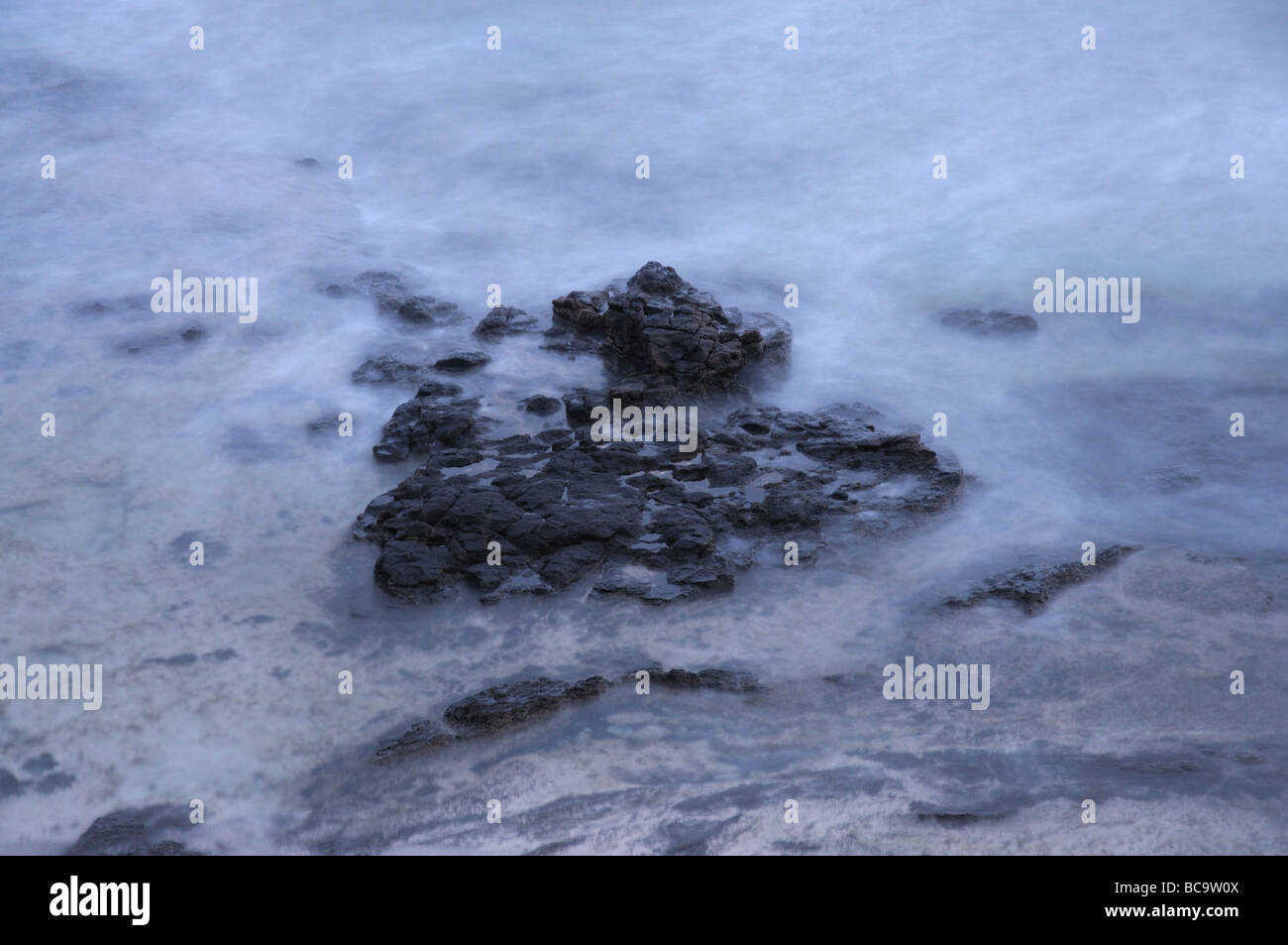 Rock in the surf, Atlantic ocean coast at Fuerteventura Stock Photo - Alamy