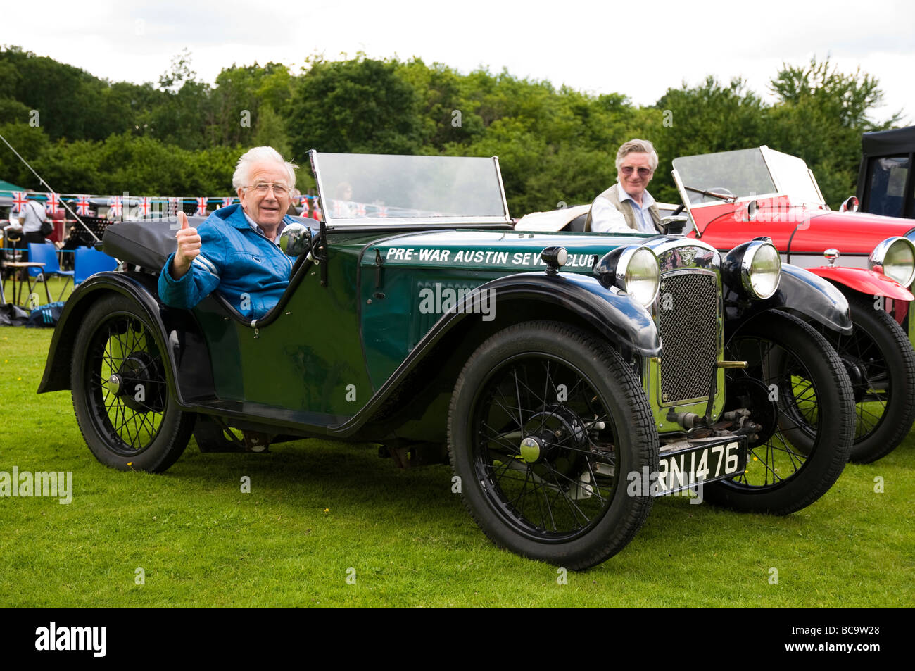 Vintage Car with Driver Stock Photo - Alamy