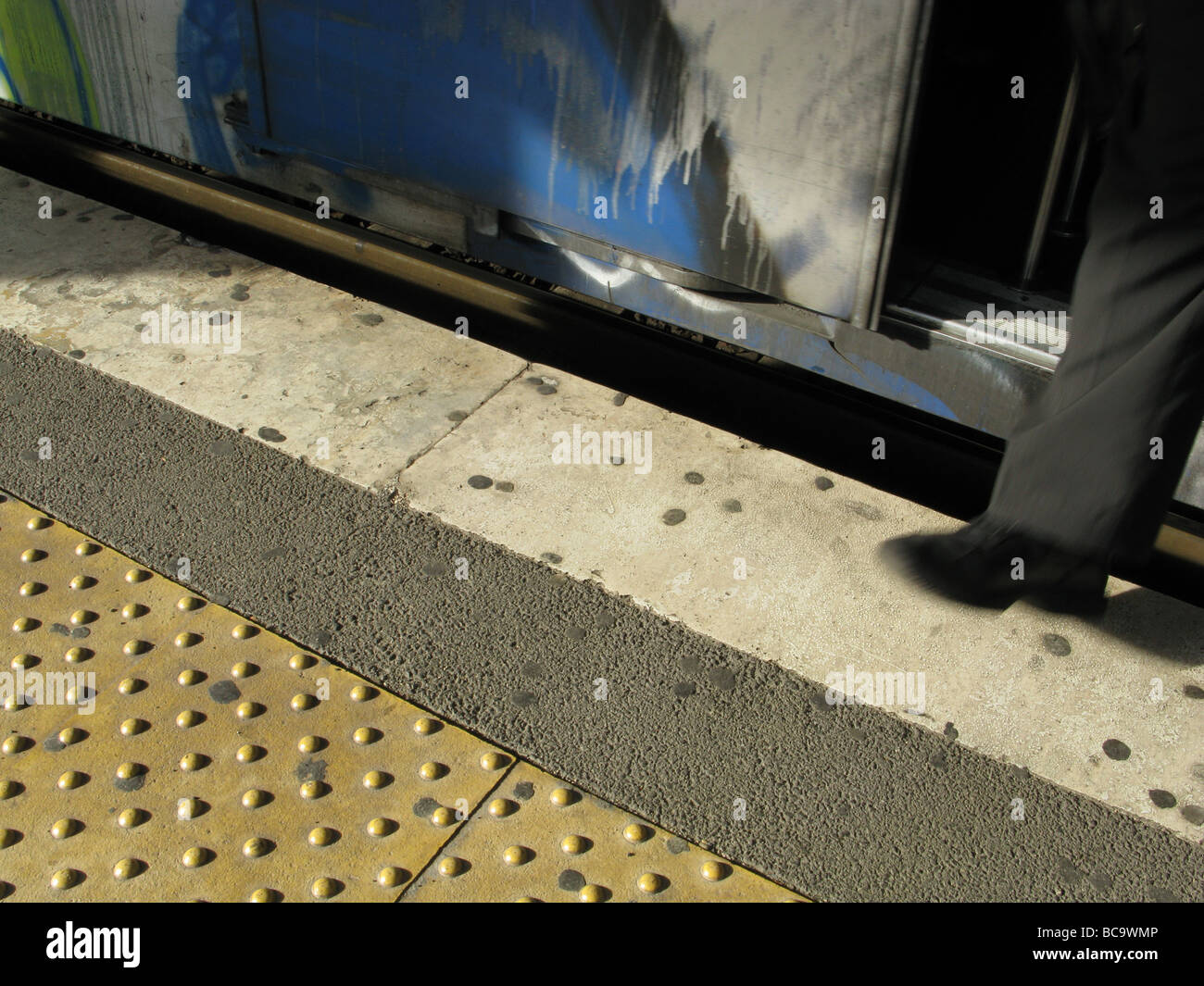 detail of fast moving train on station platform Stock Photo - Alamy