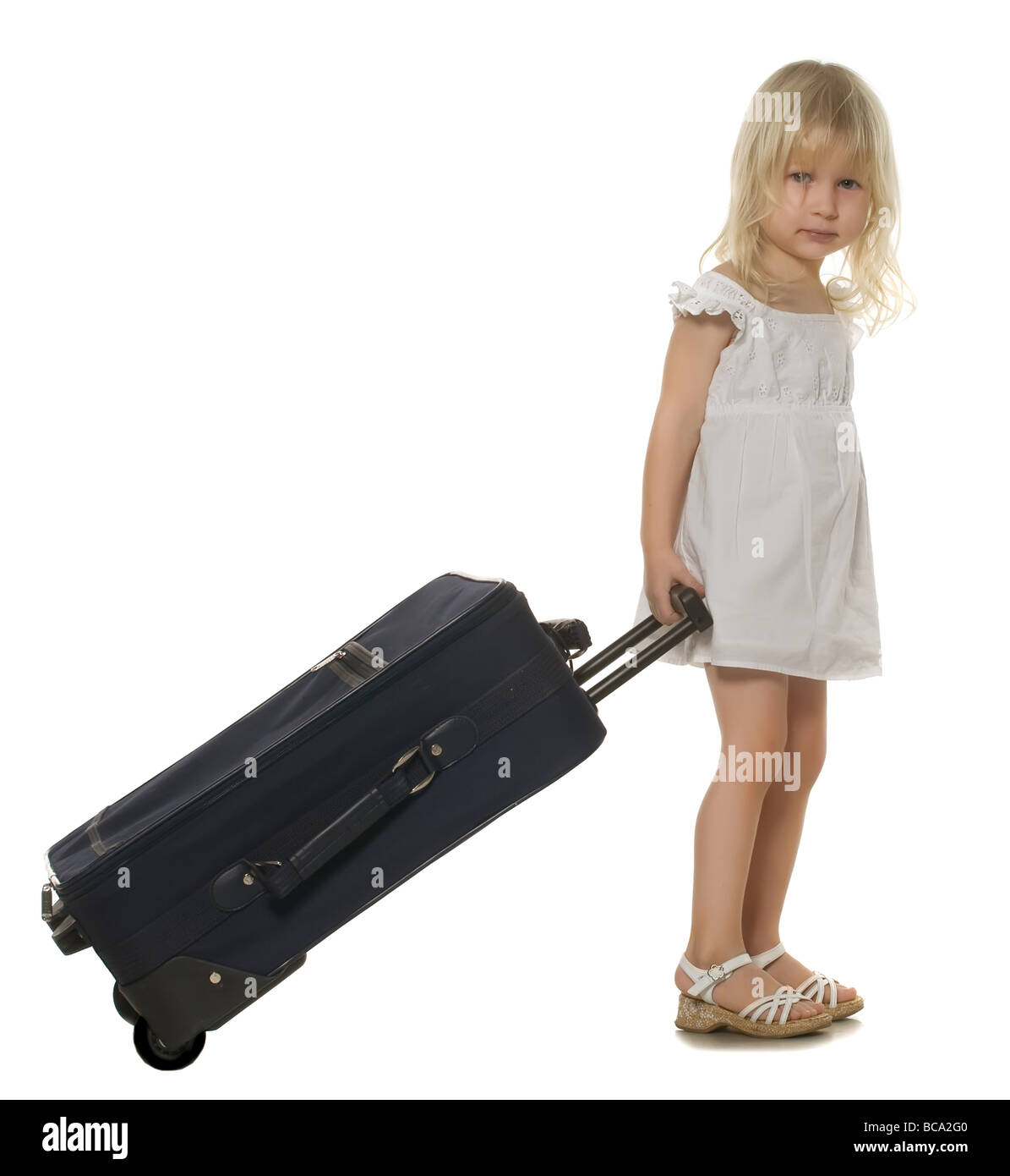 beautiful little girl a white dress carries suitcase isolated on white ...