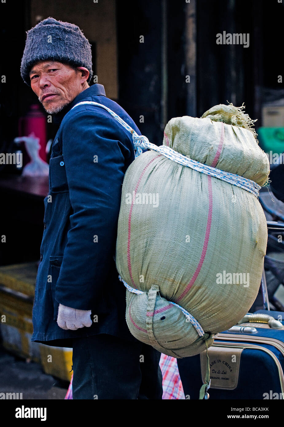 Chinese people carrier hi-res stock photography and images - Alamy