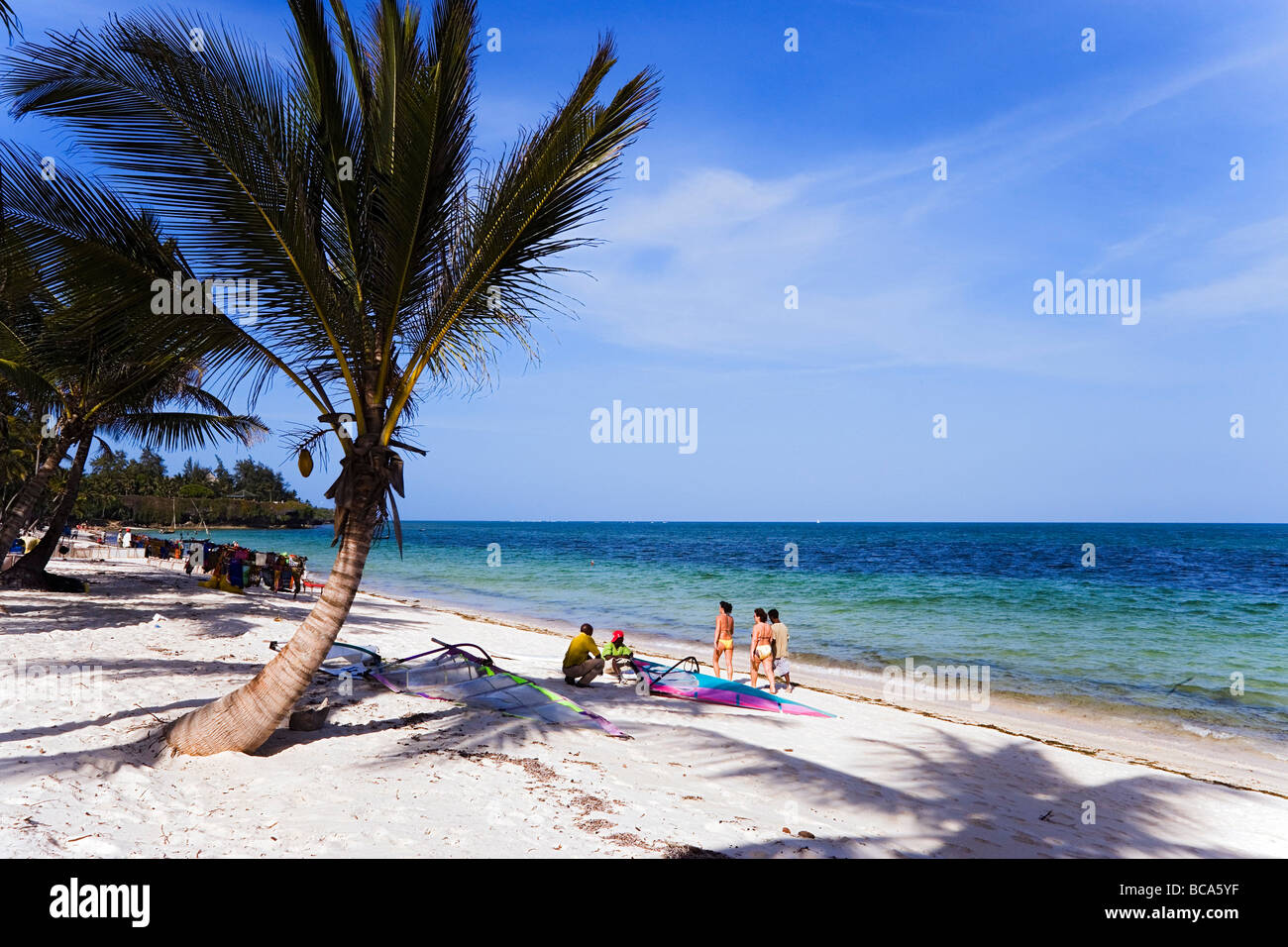 Tourists relaxing at Shanzu Beach, Coast, Kenya Stock Photo - Alamy