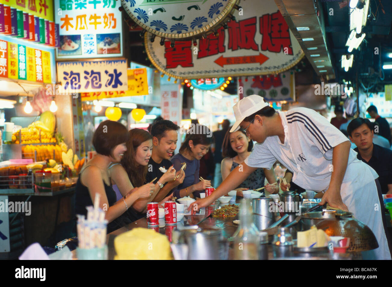 People asia dining with locals hi-res stock photography and images - Alamy