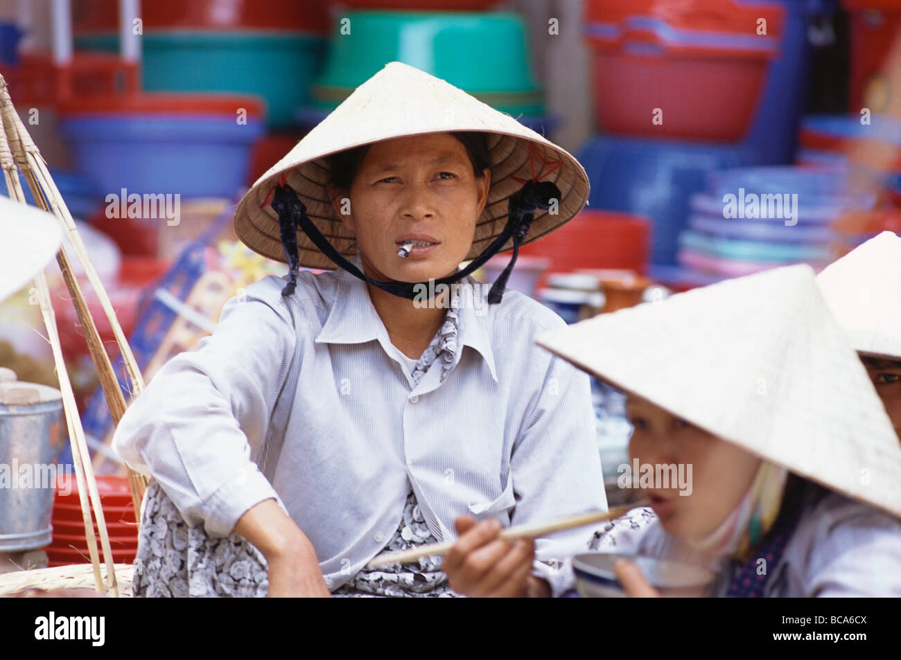 A female vendor, Market, City Scape. Hoi An, Vietnam Stock Photo - Alamy