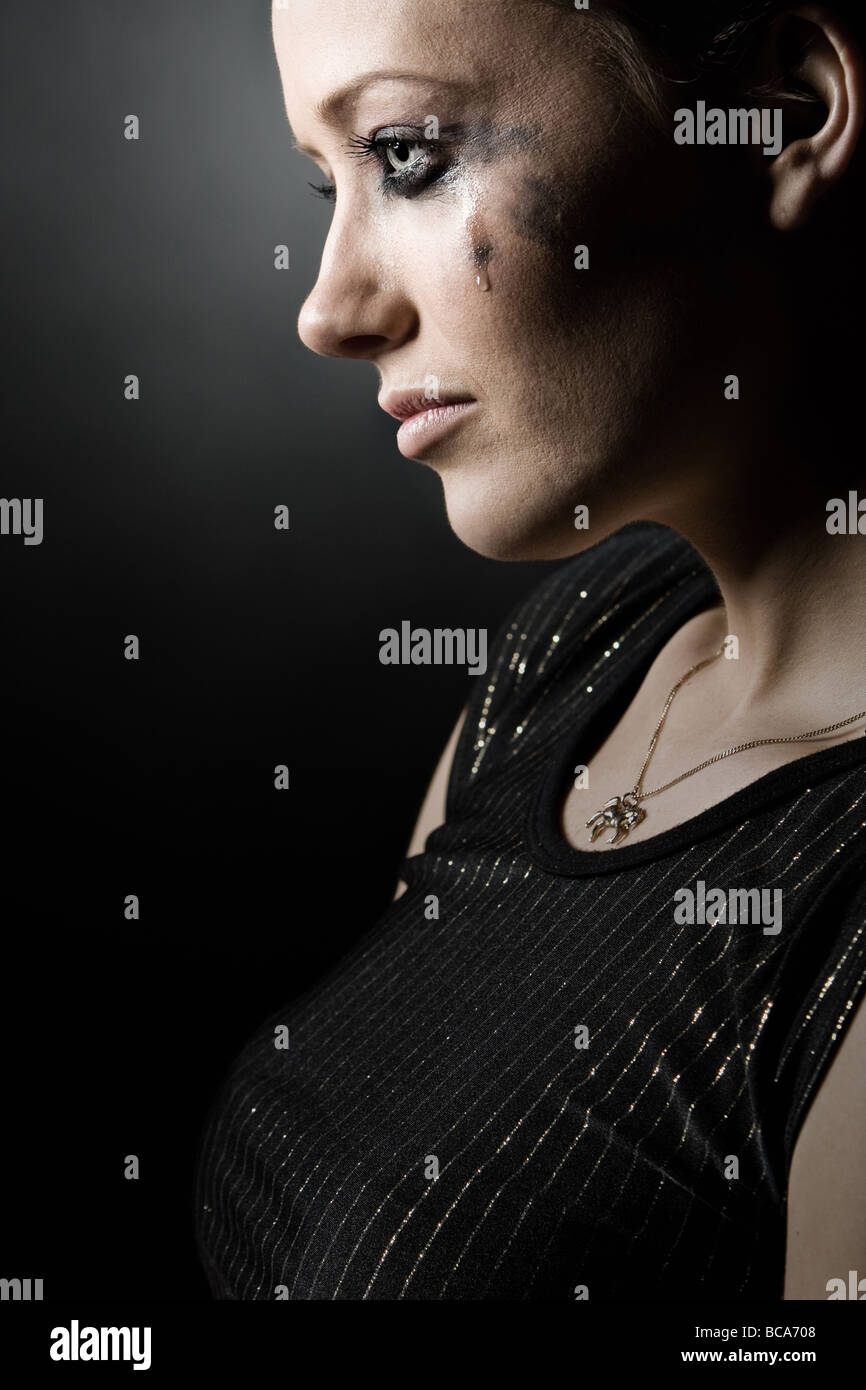 Tear rolling down face hi-res stock photography and images - Alamy