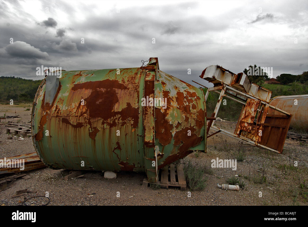 Abandoned iron waste in landscape Stock Photo - Alamy