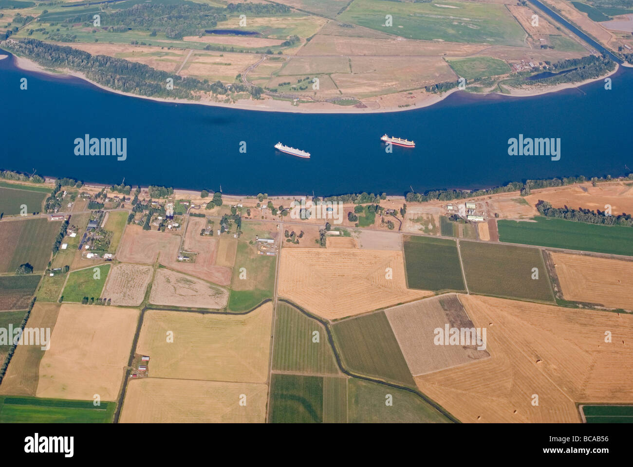 Aerial of cargo ships on the Columbia River west of Portland, Oregon ...