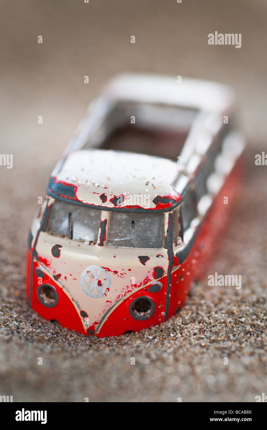 An old model of a campervan or bus stuck in sand Stock Photo - Alamy