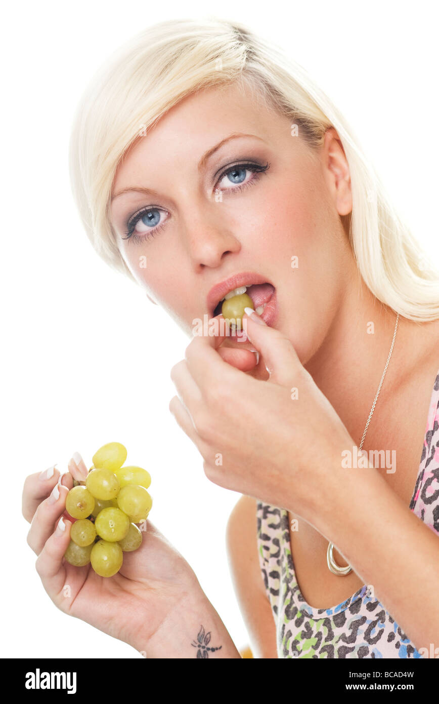 woman eating grapes Stock Photo - Alamy