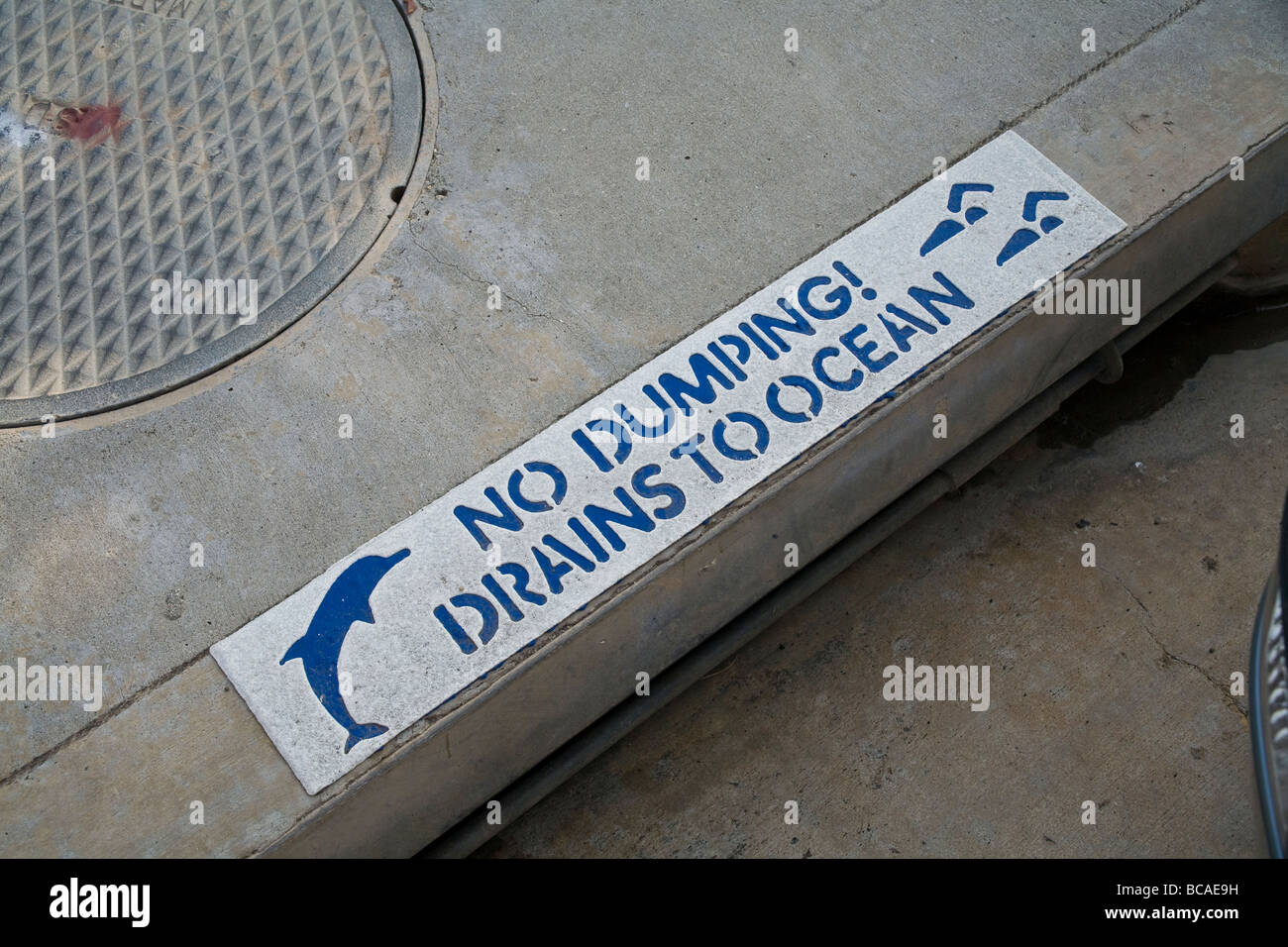 Storm drain warning hi-res stock photography and images - Alamy
