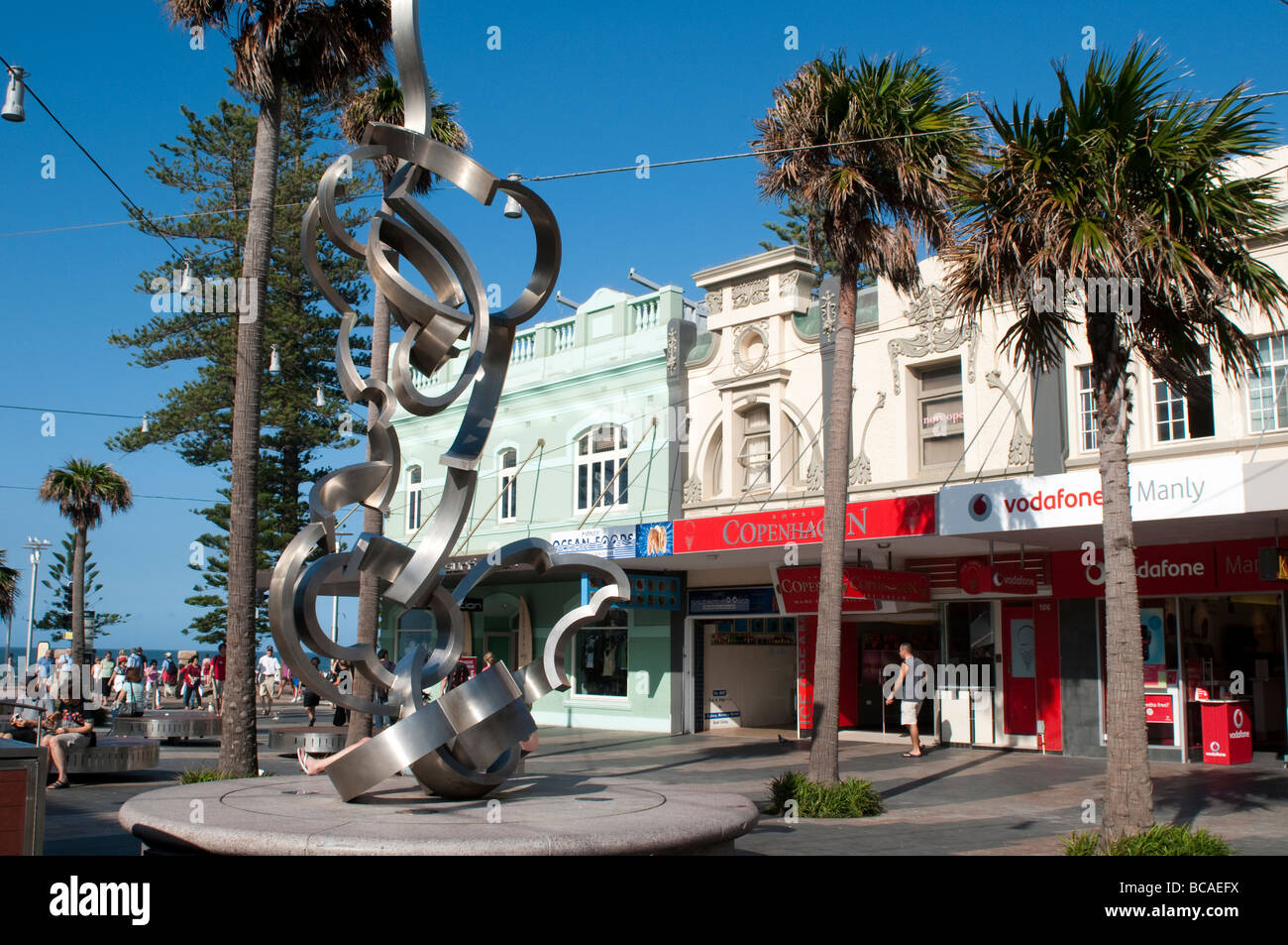 The Corso with abstract sculpture palms and houses in Manly, Sydney ...