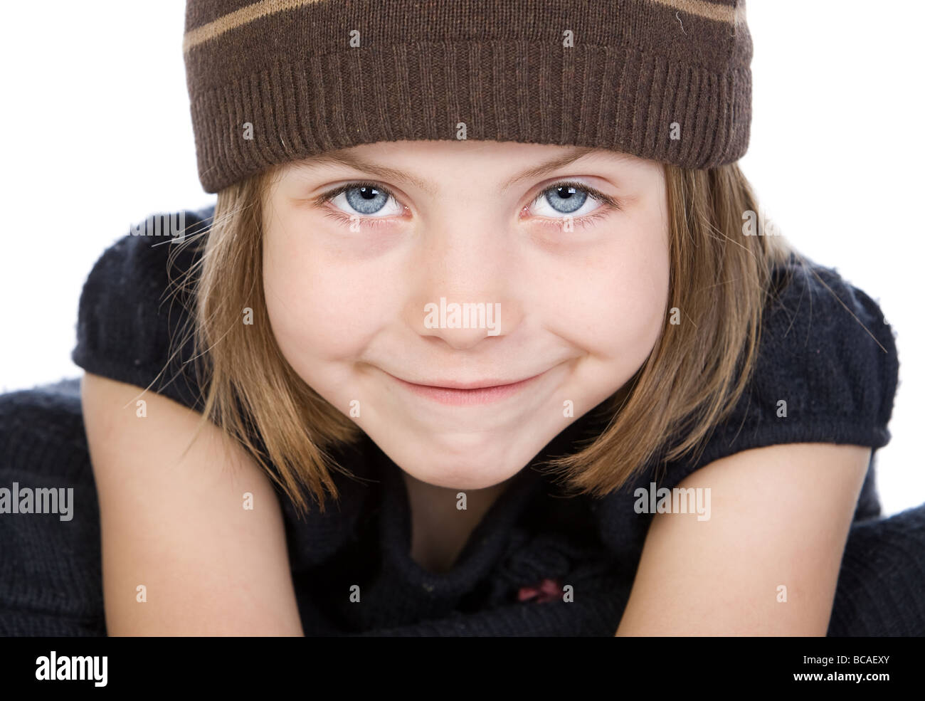 Shot of a Cute Blue Eyed Child with a Cheeky Grin Stock Photo - Alamy