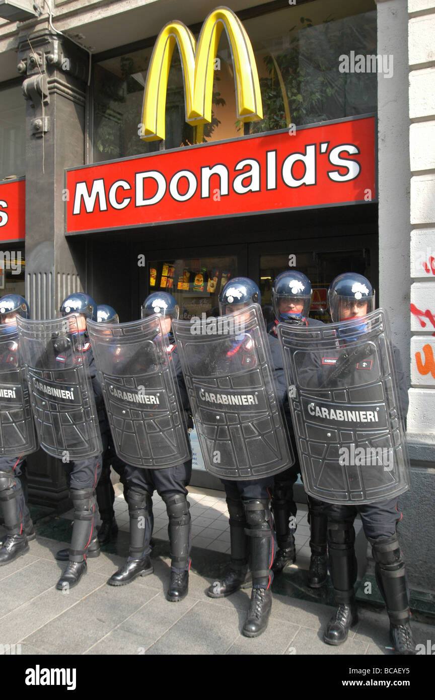 the police protects a Mc Donald's fast food during a demonstration of ...