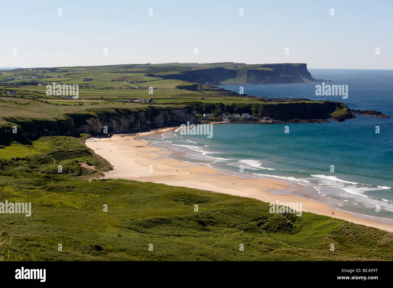 White Park Bay with the small fishing village of Portbradden at the ...