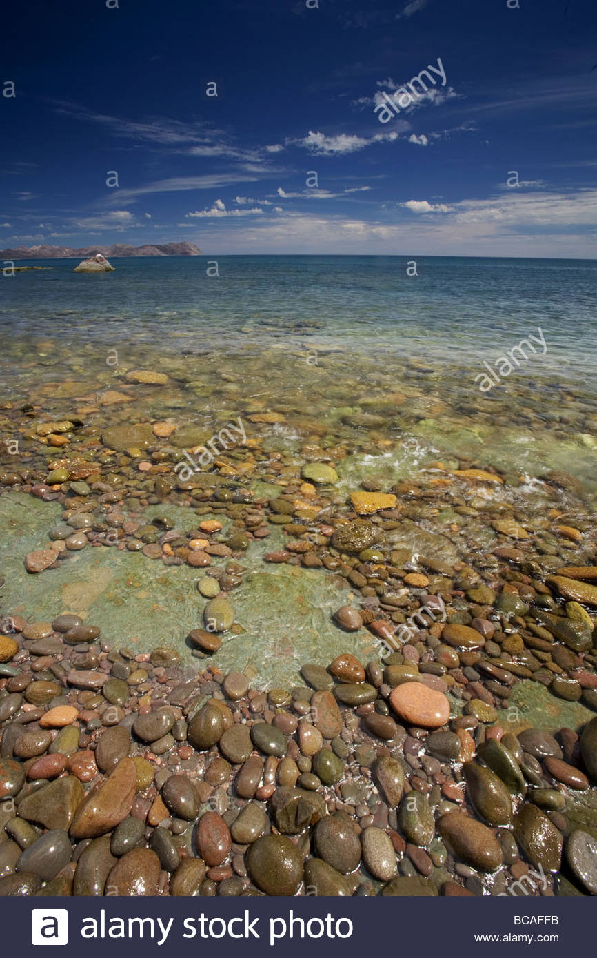 Waves wash over rocky sea hi-res stock photography and images - Alamy