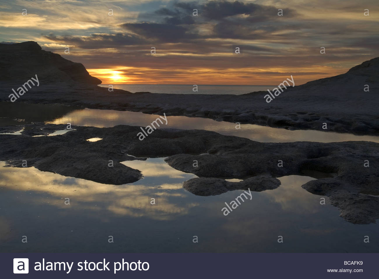 Tide pool reflection at sunrise, Baja California, Mexico Stock Photo ...