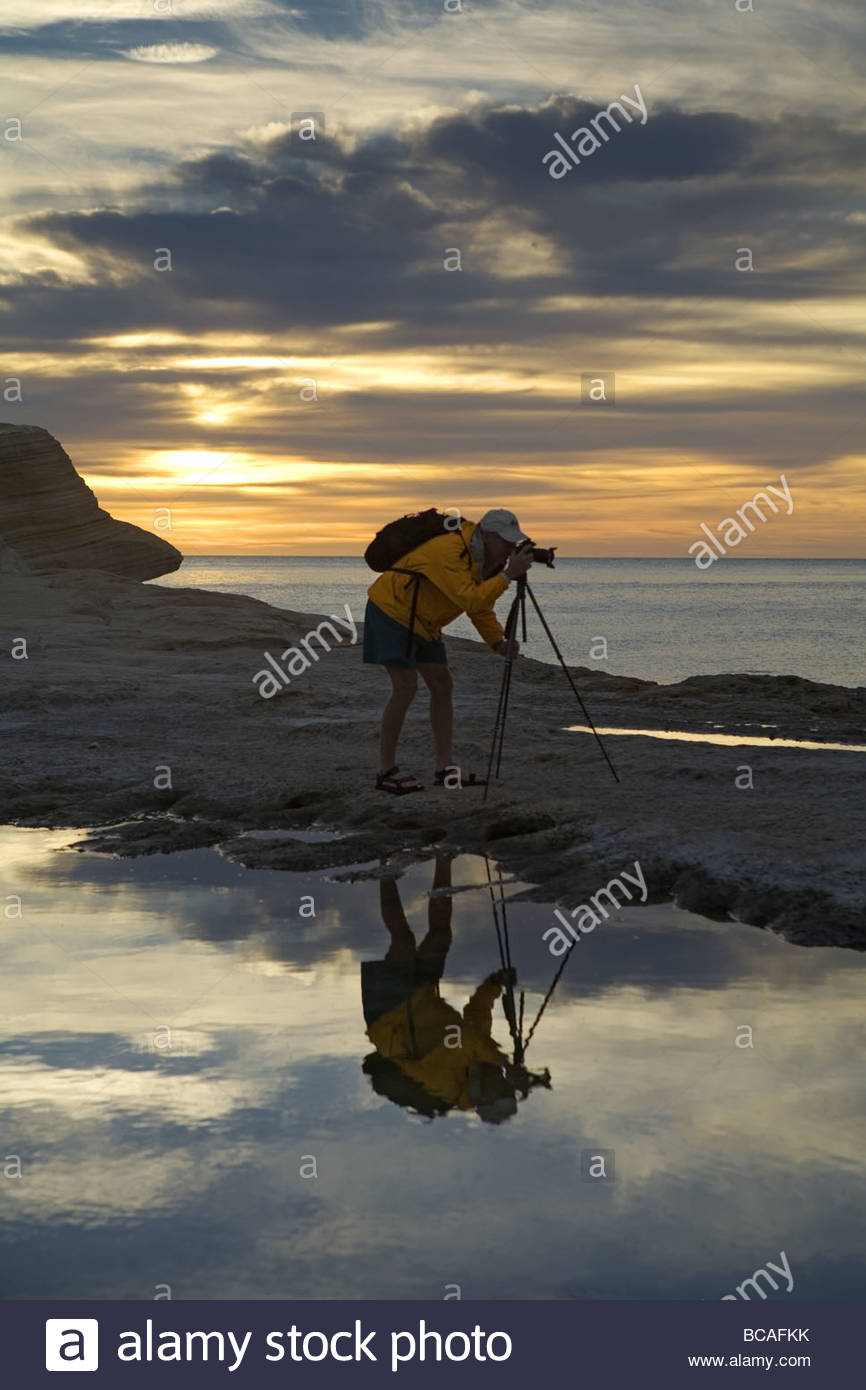 Photographer reflection at sunrise, Baja California, Mexico Stock Photo ...