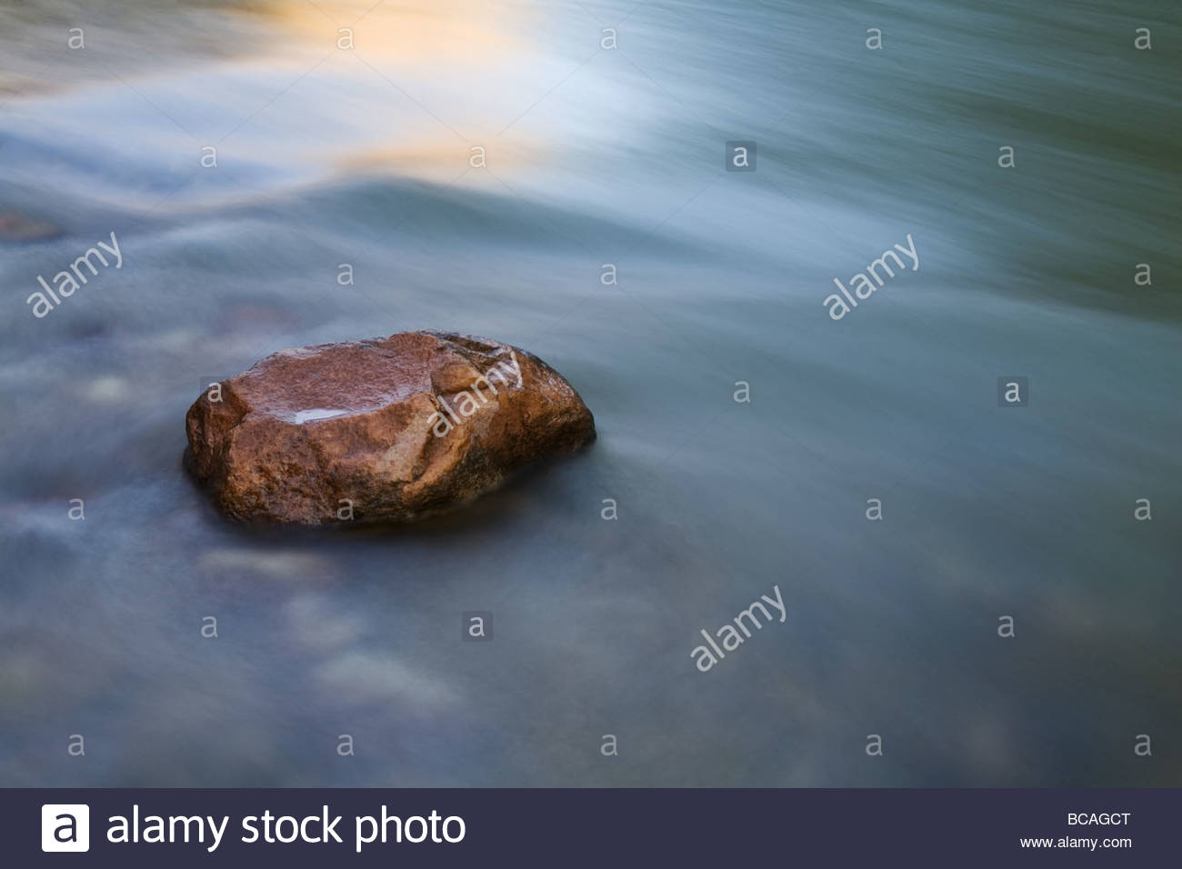 Boulder and flowing water, Colorado River, Grand Canyon, Arizona Stock ...