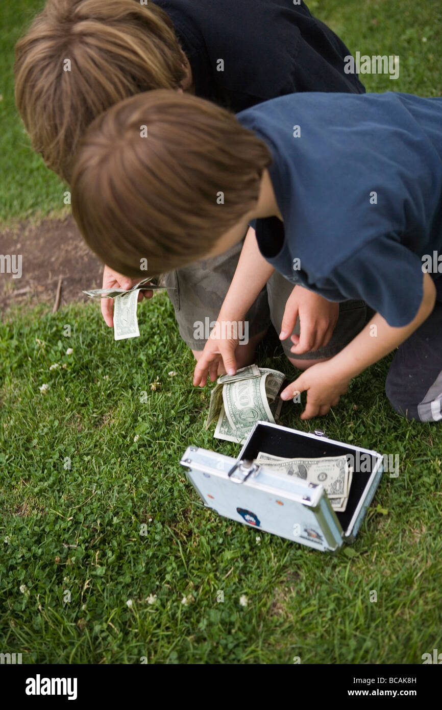 Child raising money hi-res stock photography and images - Alamy