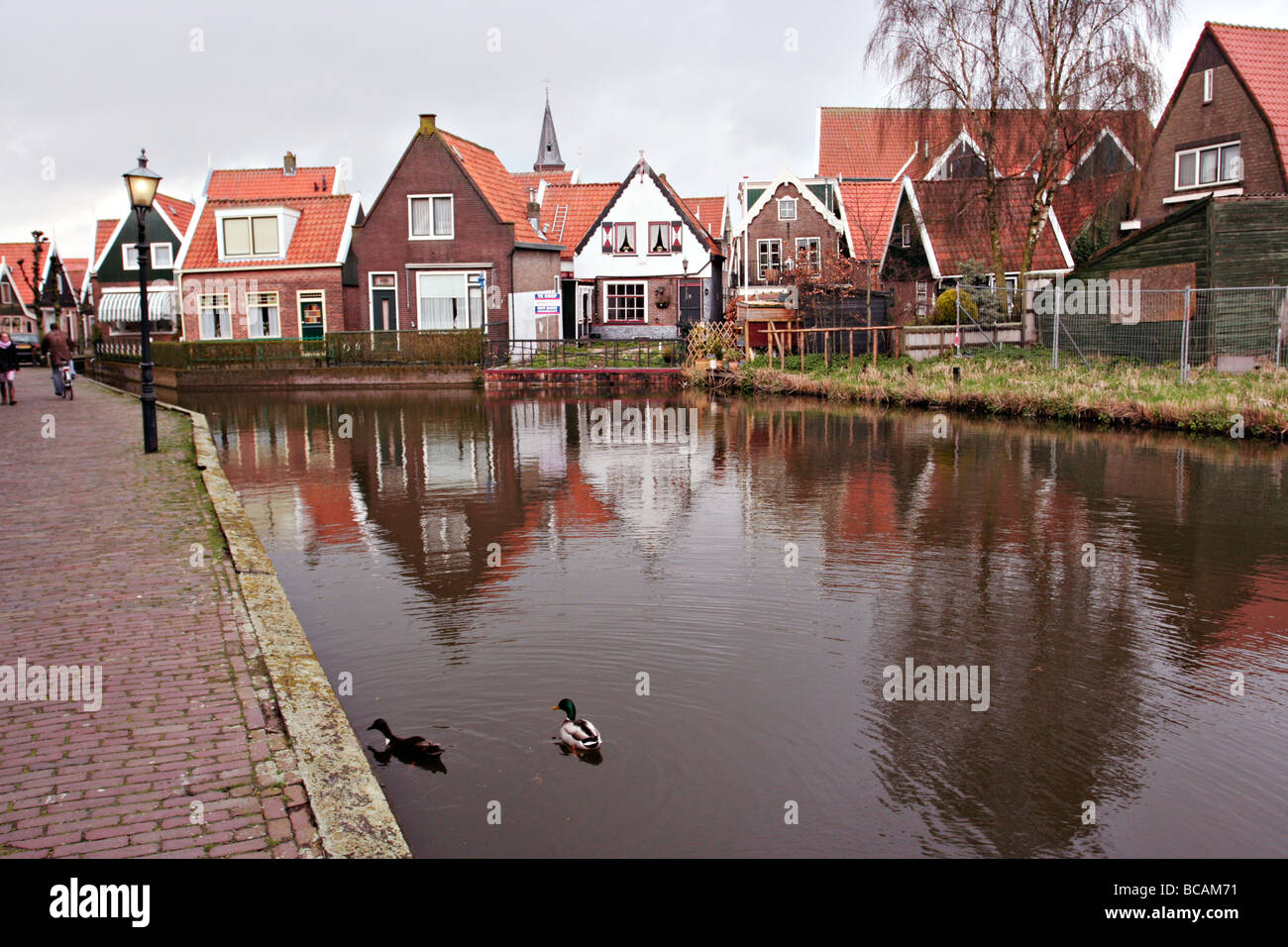 Traditional buildings at the fishing village of Volendam in Holland ...