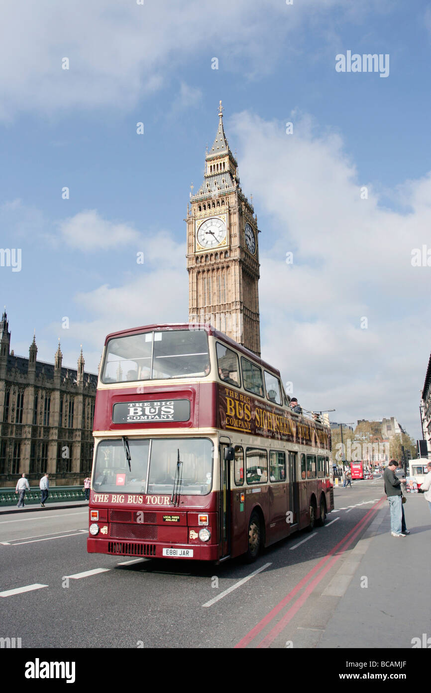 Open top double decker tour bus in front of Big Ben in London, UK Stock ...