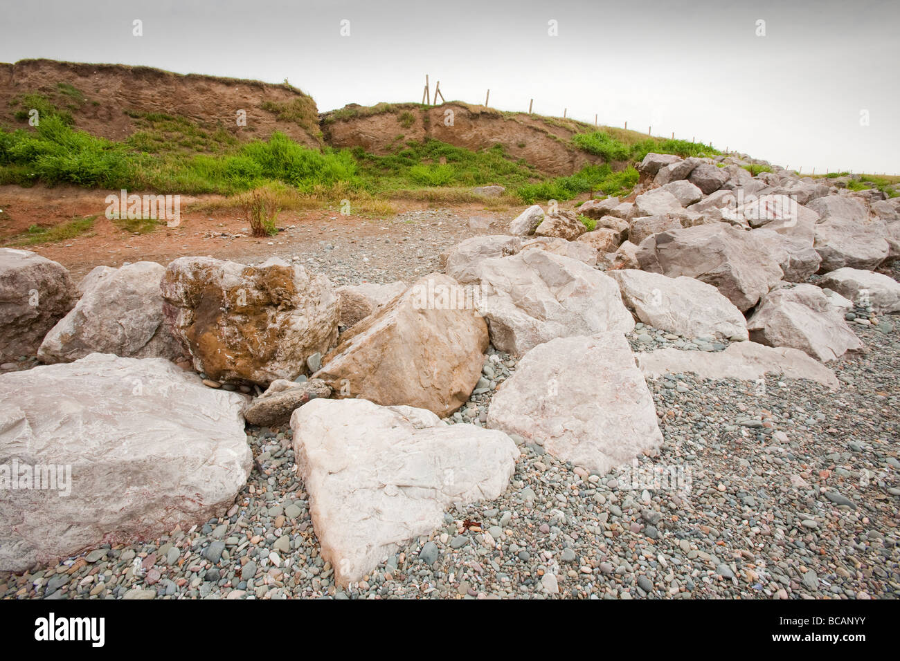 Large rocks placed on the shore of the west coast of Walney Island UK ...