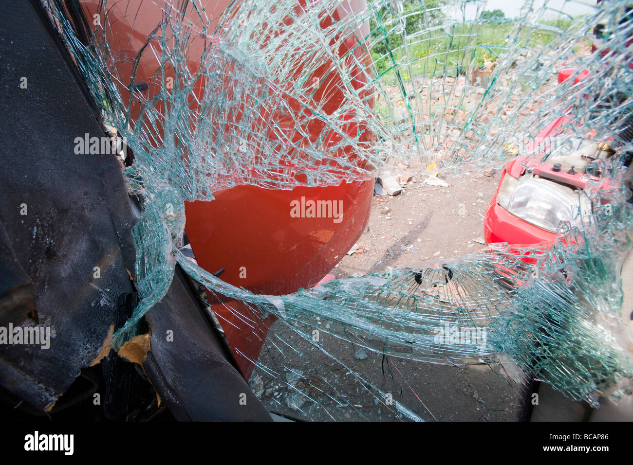 A crashed car with a smashed windscreen Stock Photo - Alamy