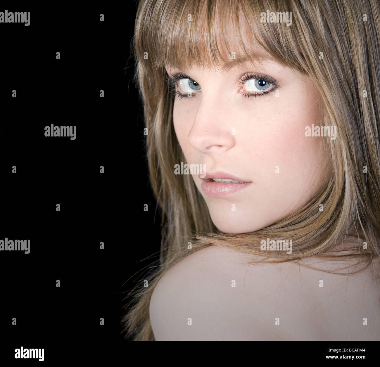 Pretty girl looking over shoulder hi-res stock photography and images ...
