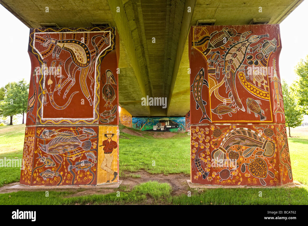 Outdoor art works painted on pylons of bridge spanning Lachlan River at ...