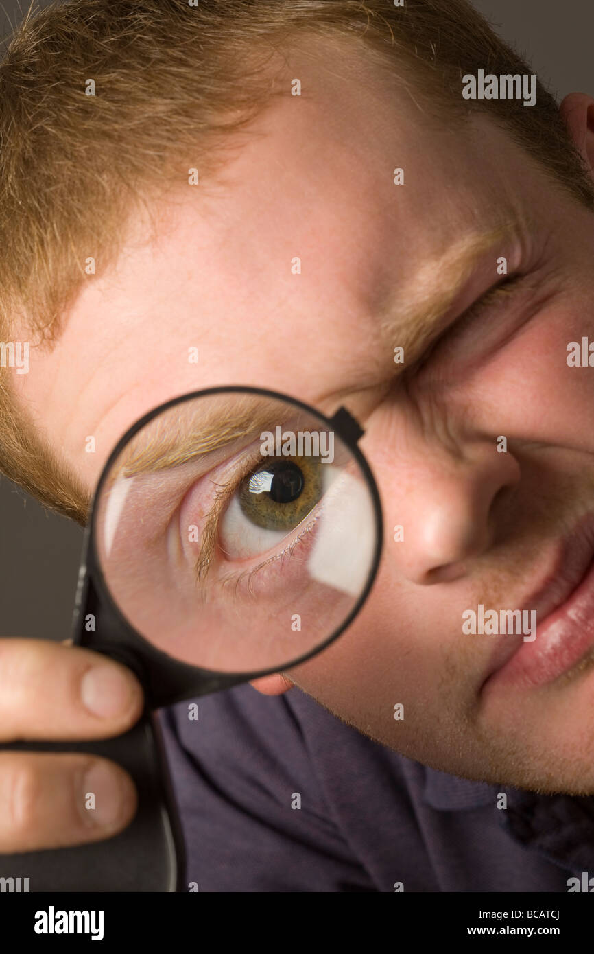 Scrutiny magnifying glass hi-res stock photography and images - Alamy