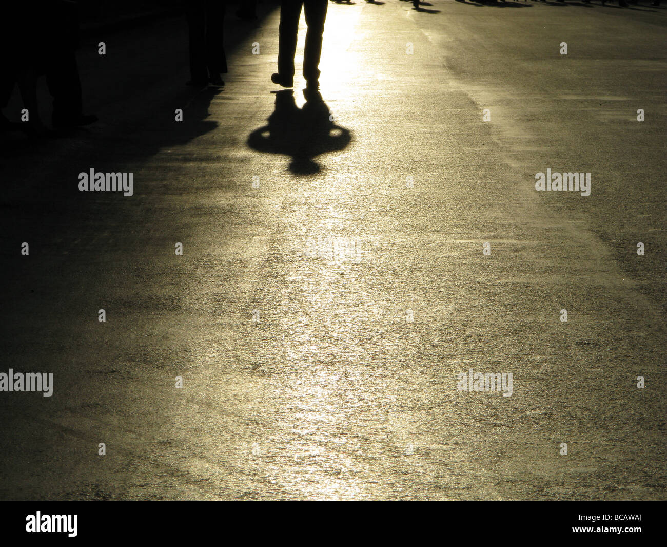 one person walking in empty street road in city town Stock Photo - Alamy