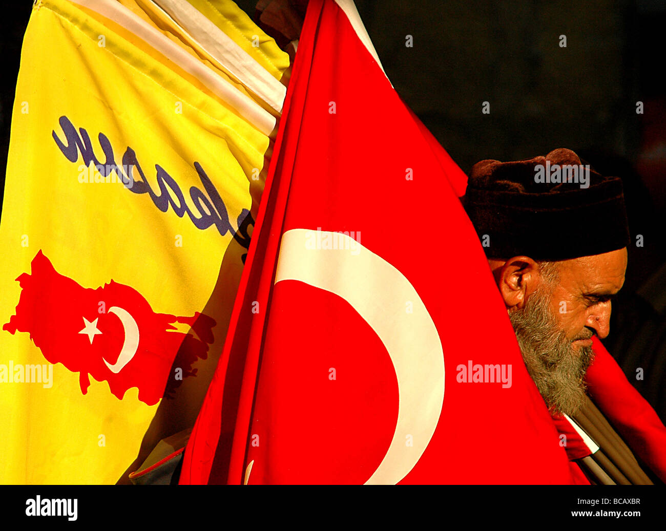 Old Turkish man selling flags Stock Photo - Alamy