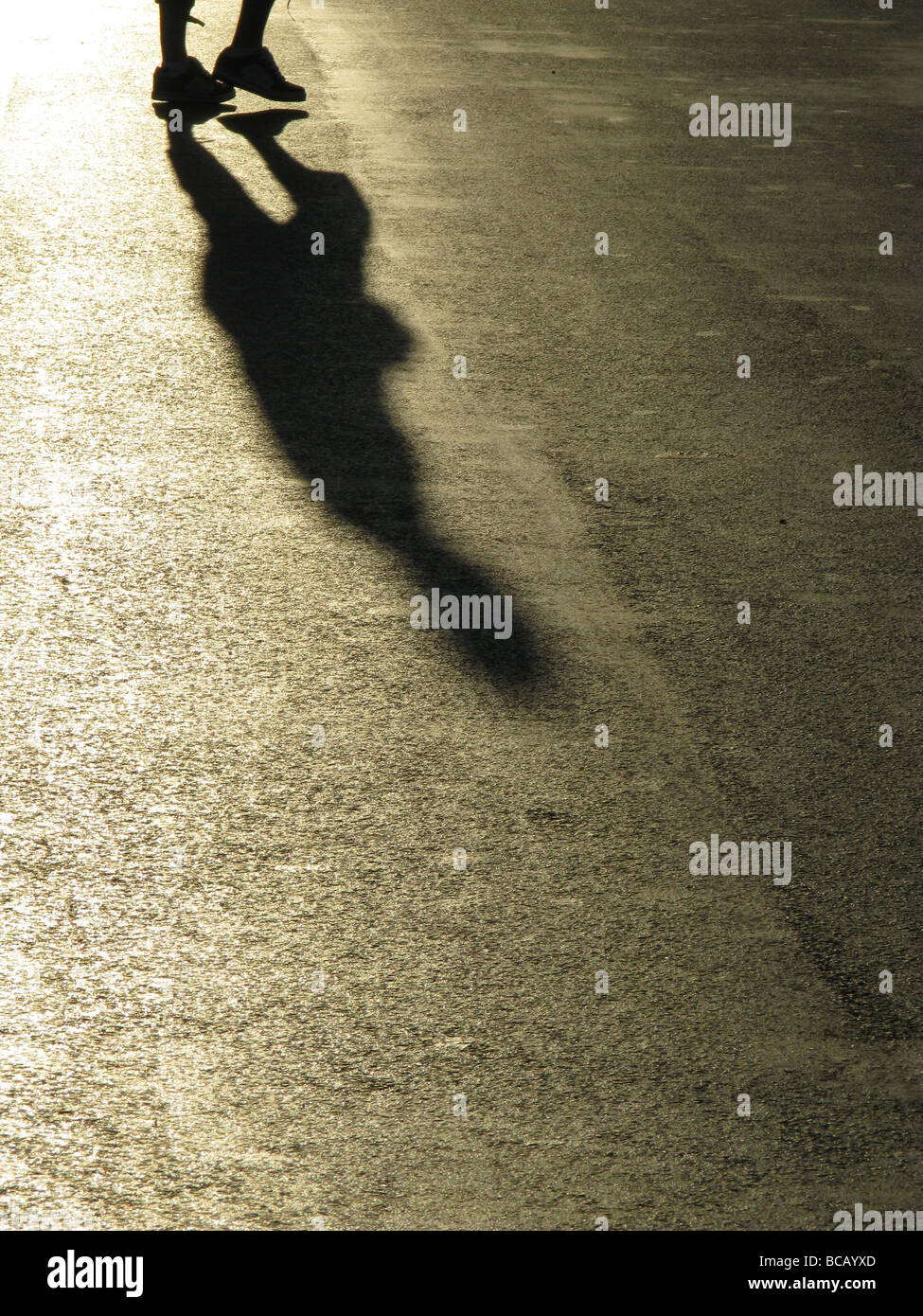 one person walking in empty street road in city town Stock Photo - Alamy
