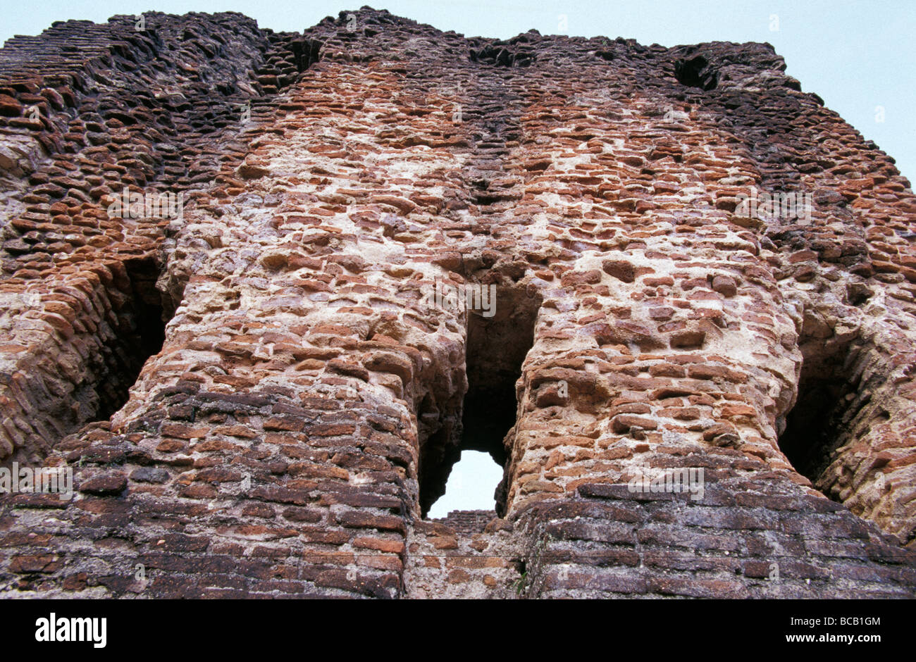 The crumbling stone brick walls of the Polonnaruwa Ancient City ruins ...