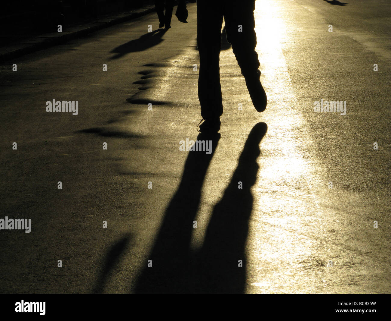 people walking in street road in city town Stock Photo - Alamy