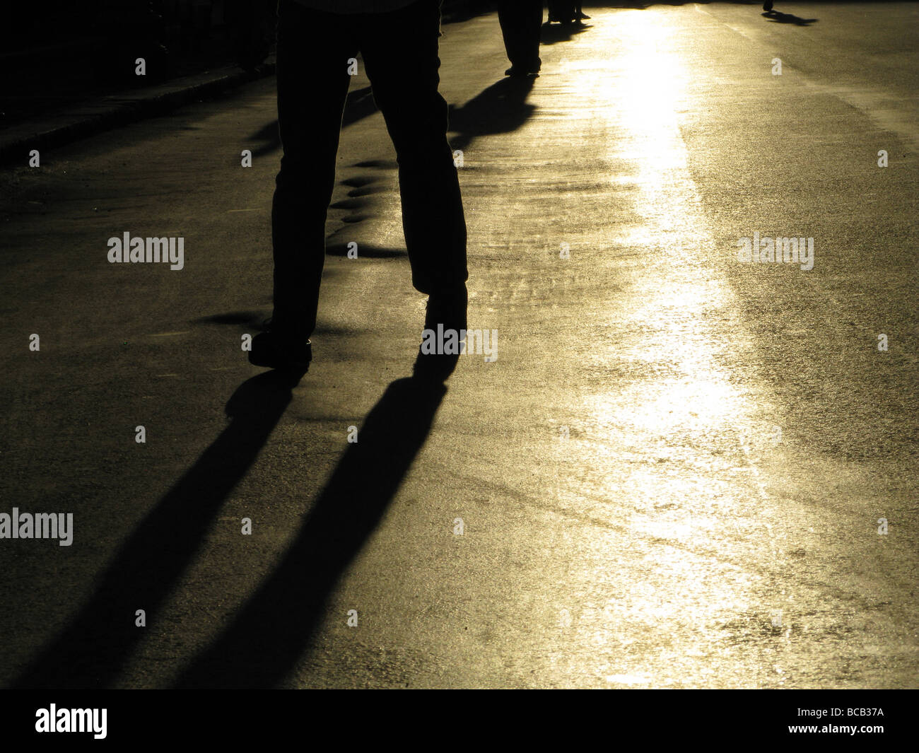people walking in street road in city town Stock Photo - Alamy