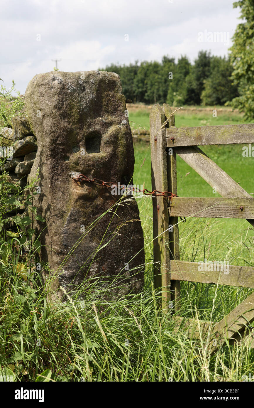 An old stone gatepost on a U.K. farm Stock Photo - Alamy