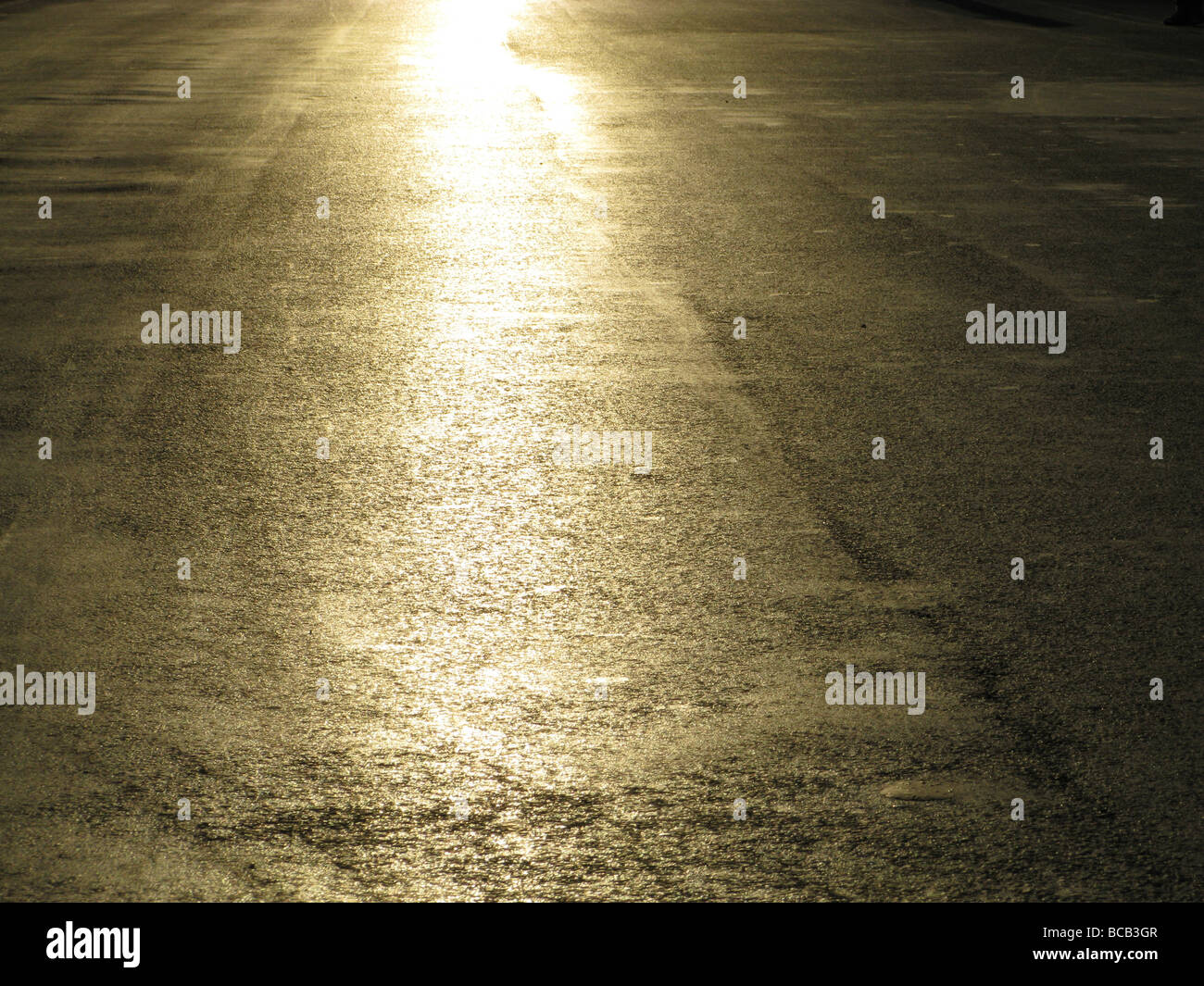 empty street in city town at sunset Stock Photo - Alamy