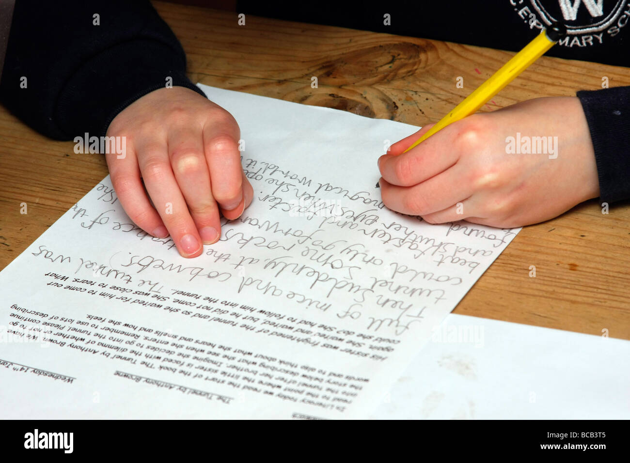 eight year old boy s hand doing school homework left handed Stock Photo ...