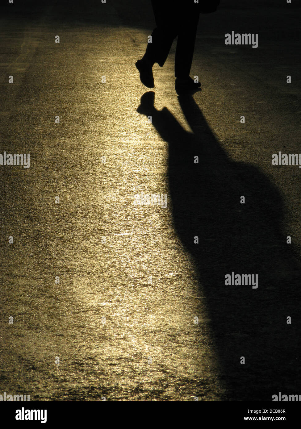 one person walking in empty street road in city town Stock Photo - Alamy