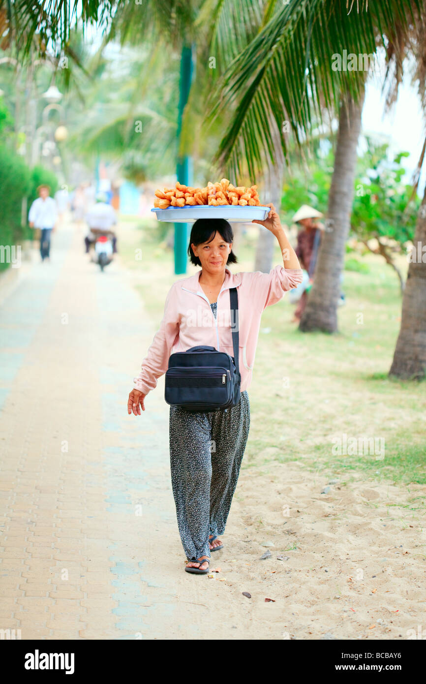 Woman sell the cakes Stock Photo - Alamy