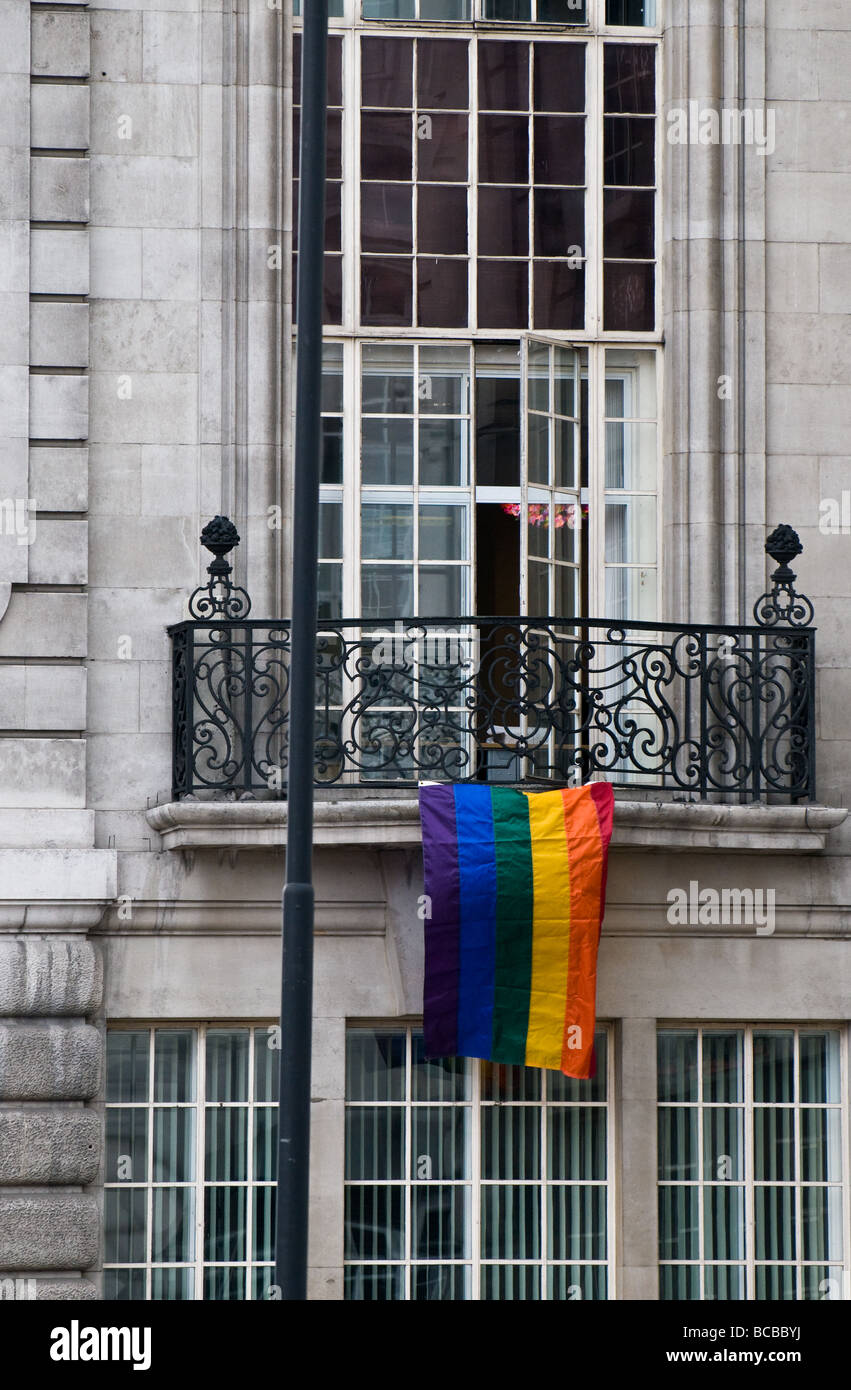 A Gay Pride banner hanging from the balcony of a building in London ...