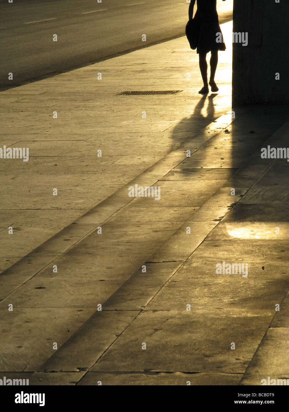 young woman walking in street road in city town Stock Photo - Alamy