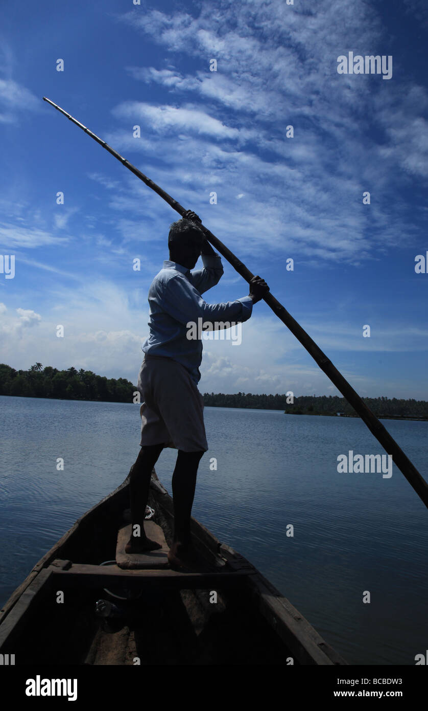 Wooden canoe taking visitors across lake to Ponnumthuruthu island ...