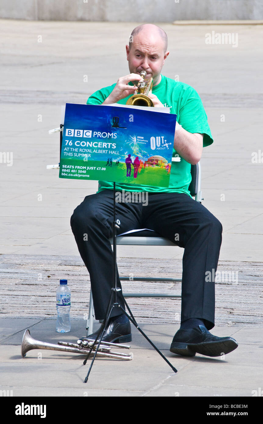 Trumpet player in a brass band, playing during a BBC Proms outdoor ...