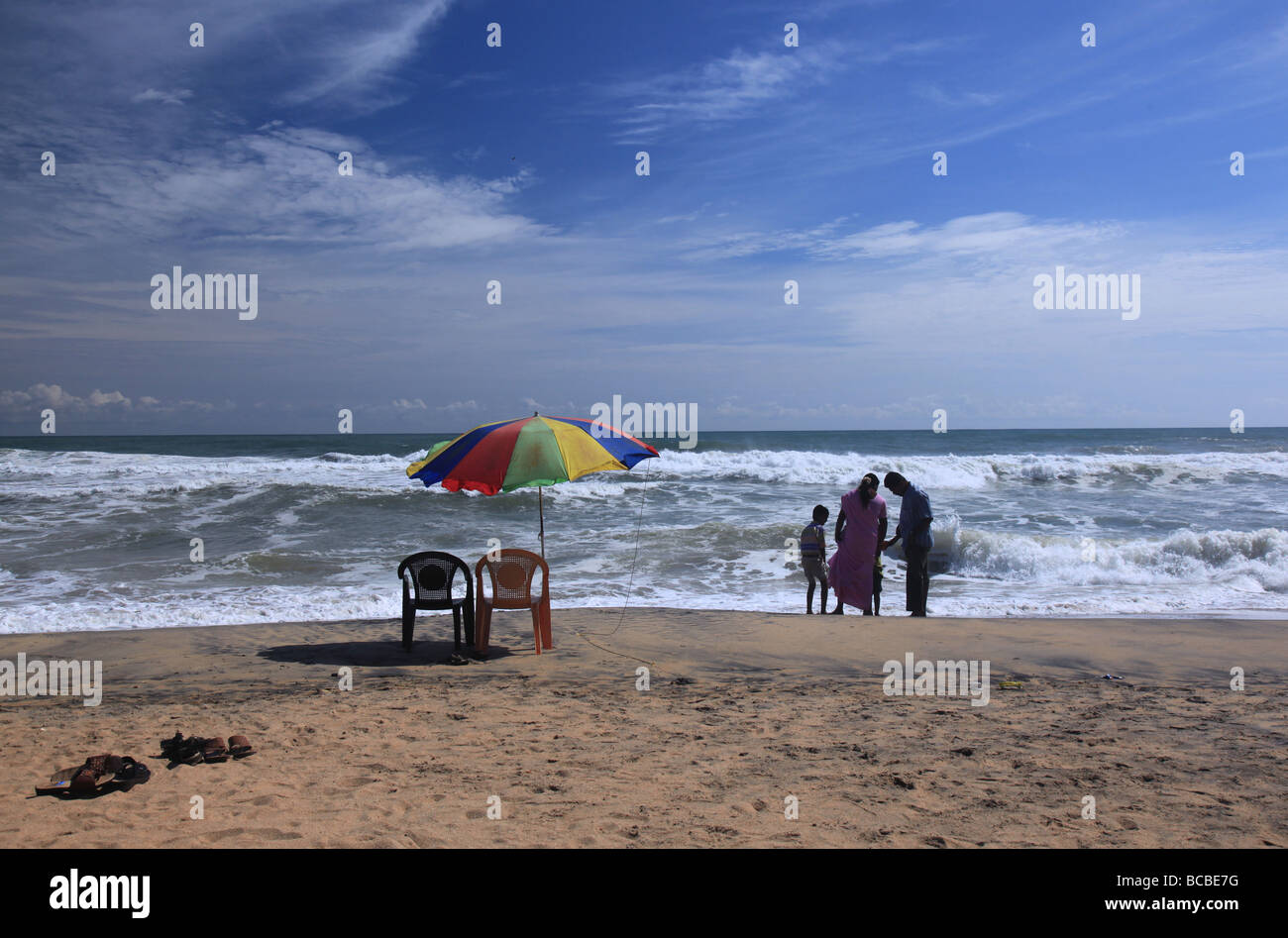 Family on Varkala beach Kerala India Stock Photo - Alamy