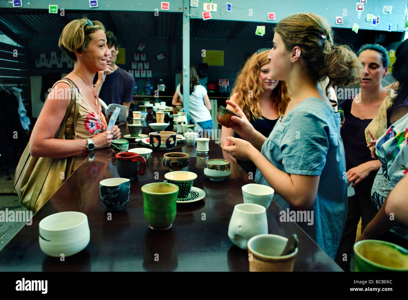 Shoppers talking chat tea customer hi-res stock photography and images ...