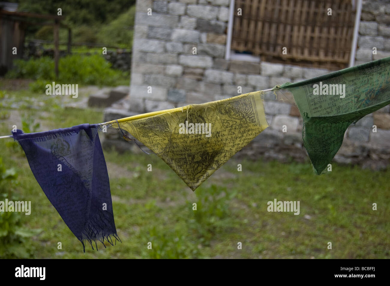 Three Tibetan Buddhist prayer flags along the Langtang trek, Nepal ...