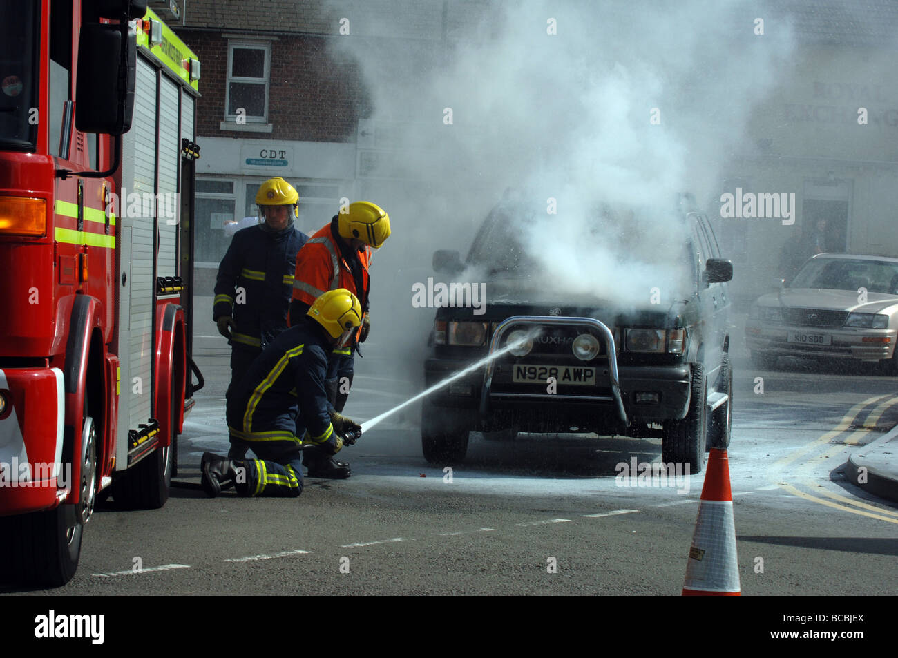 Vauxhall Frontera car fire being put out by fire service in West ...