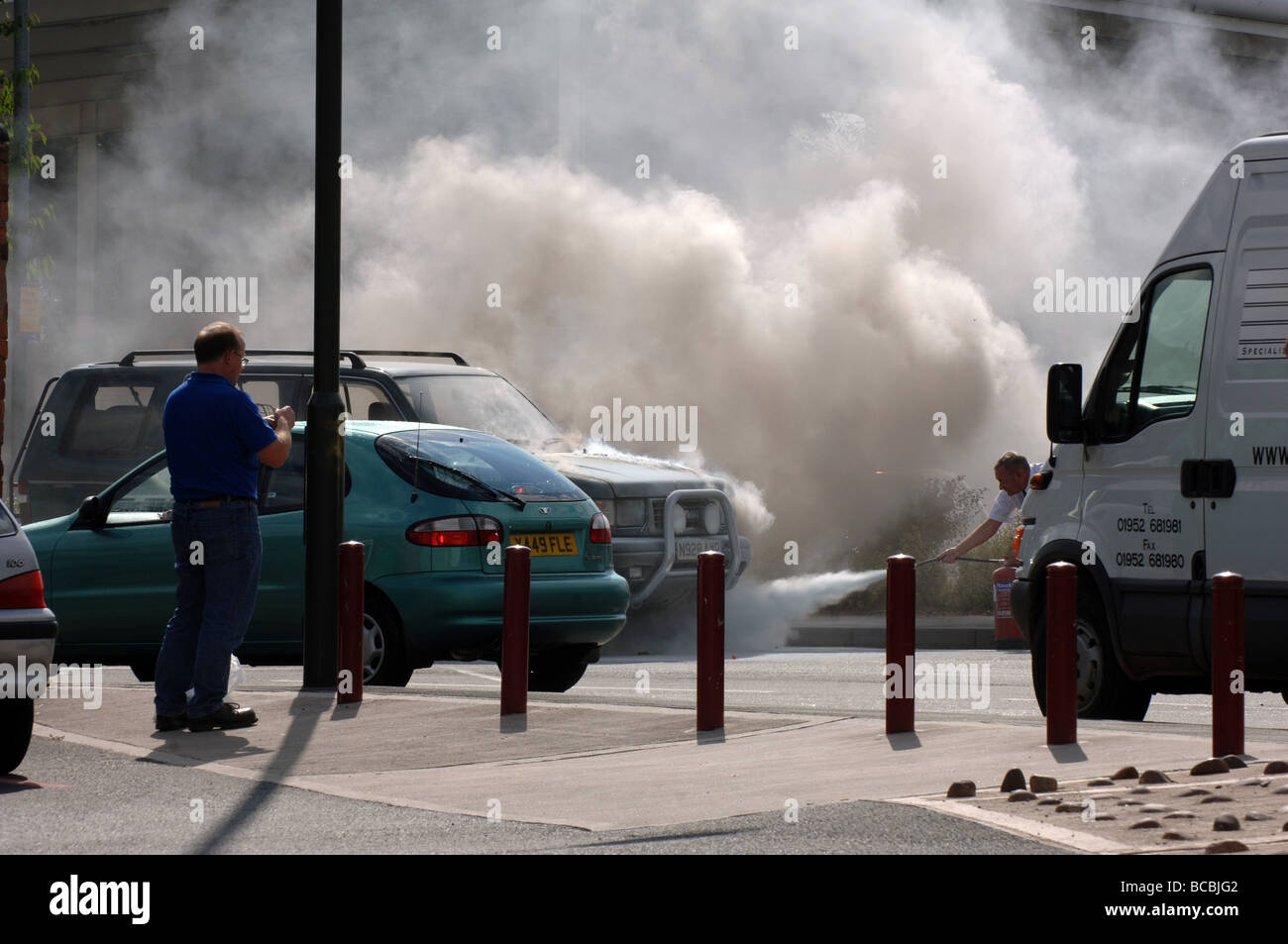 Vauxhall Frontera car fire being put out by fire service in West ...